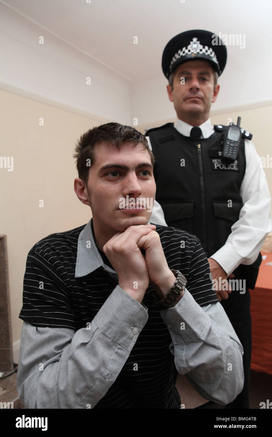 a portrait of a metropolitan police officer with a polish man stood ...