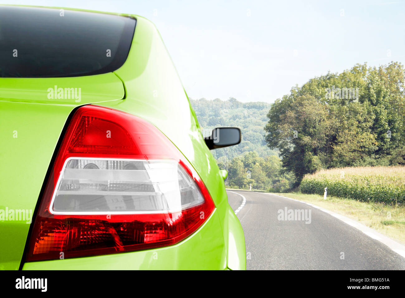 Car detail - back side, half. On the road Stock Photo - Alamy