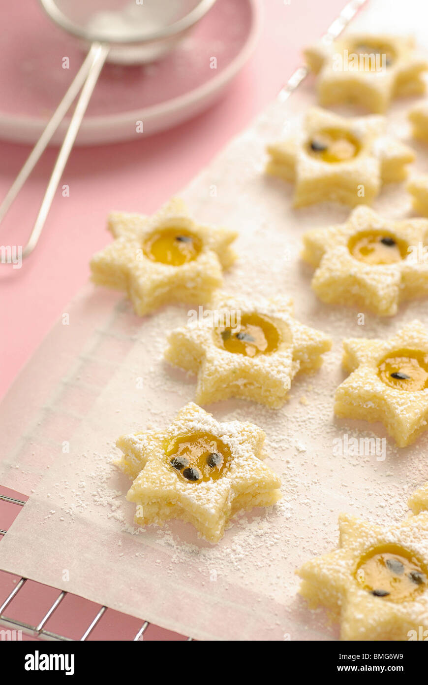 Star Shaped Biscuits on Baking Sheet, Uncooked Stock Photo - Alamy