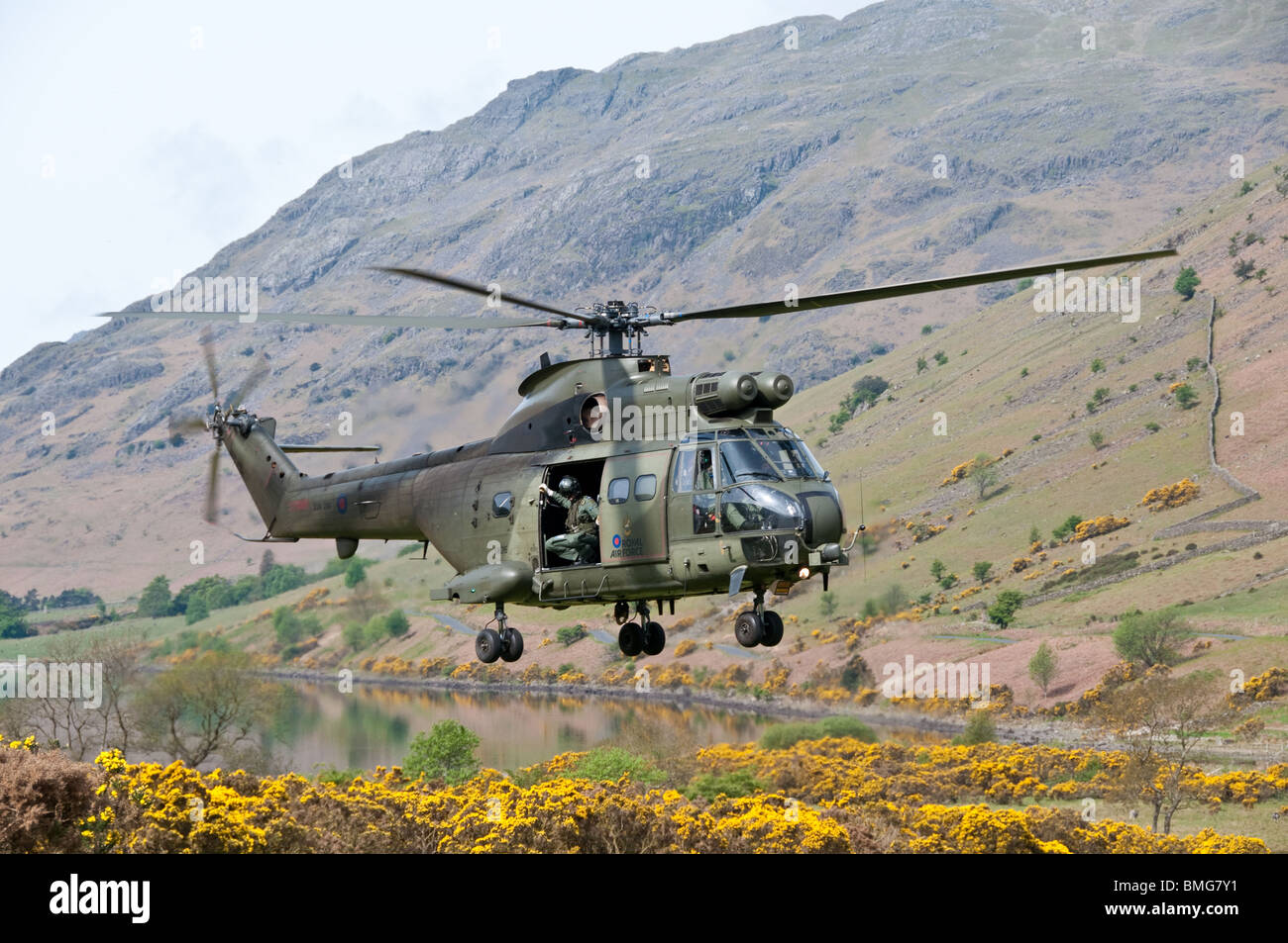 RAF Puma HC1 Helicopter on training exercise taking off from Mountain ...
