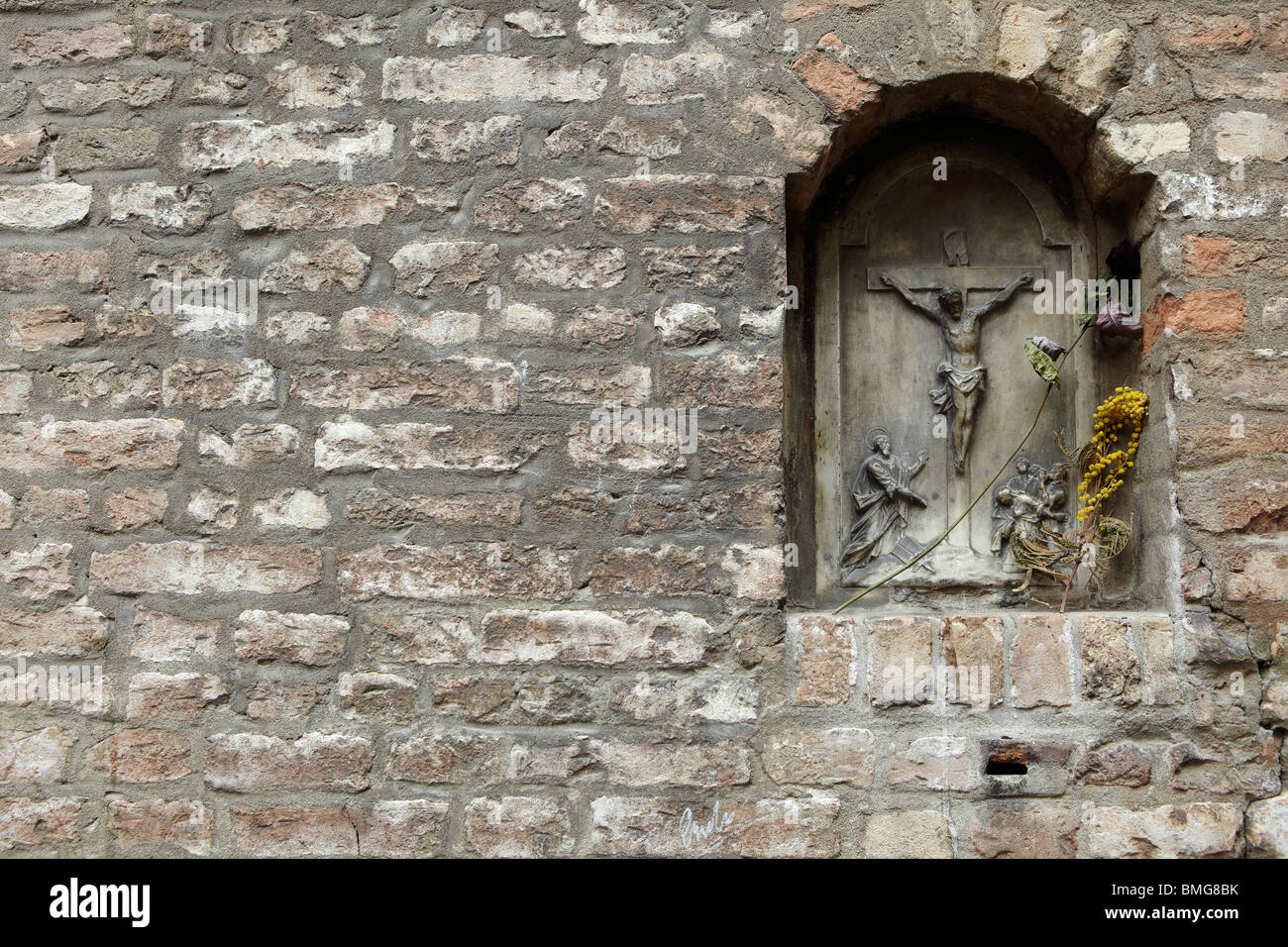 Shrine in a wall in Venice, Italy Stock Photo - Alamy