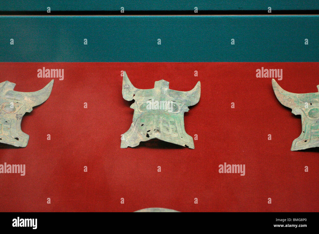 Bronze masks exhibited in Shaanxi History Museum, Xi'an, Shaanxi Province, China Stock Photo - Alamy