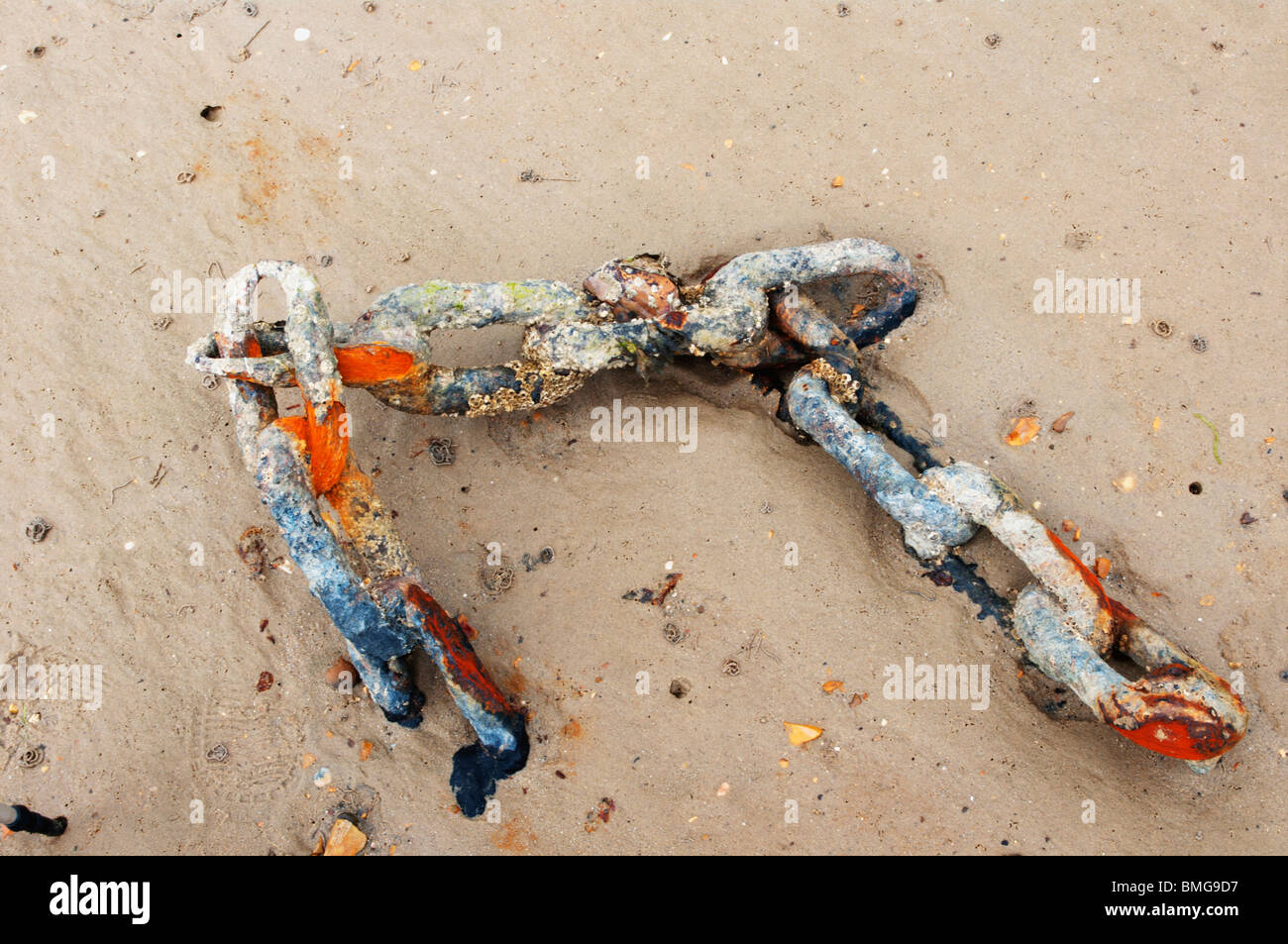 old rusty chain on beach Stock Photo - Alamy