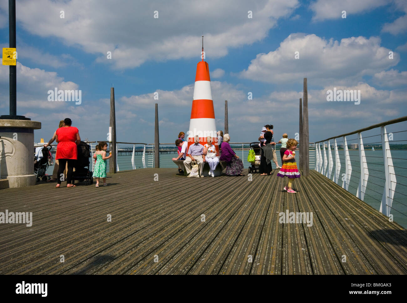 People Relaxing On The Waterfront Boardwalk Hythe Hampshire England ...