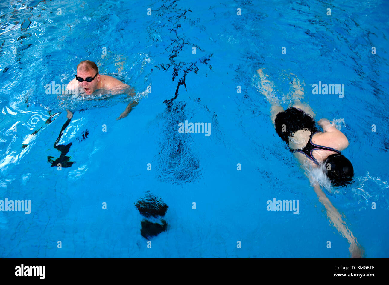 Swimmers in a pool Stock Photo - Alamy