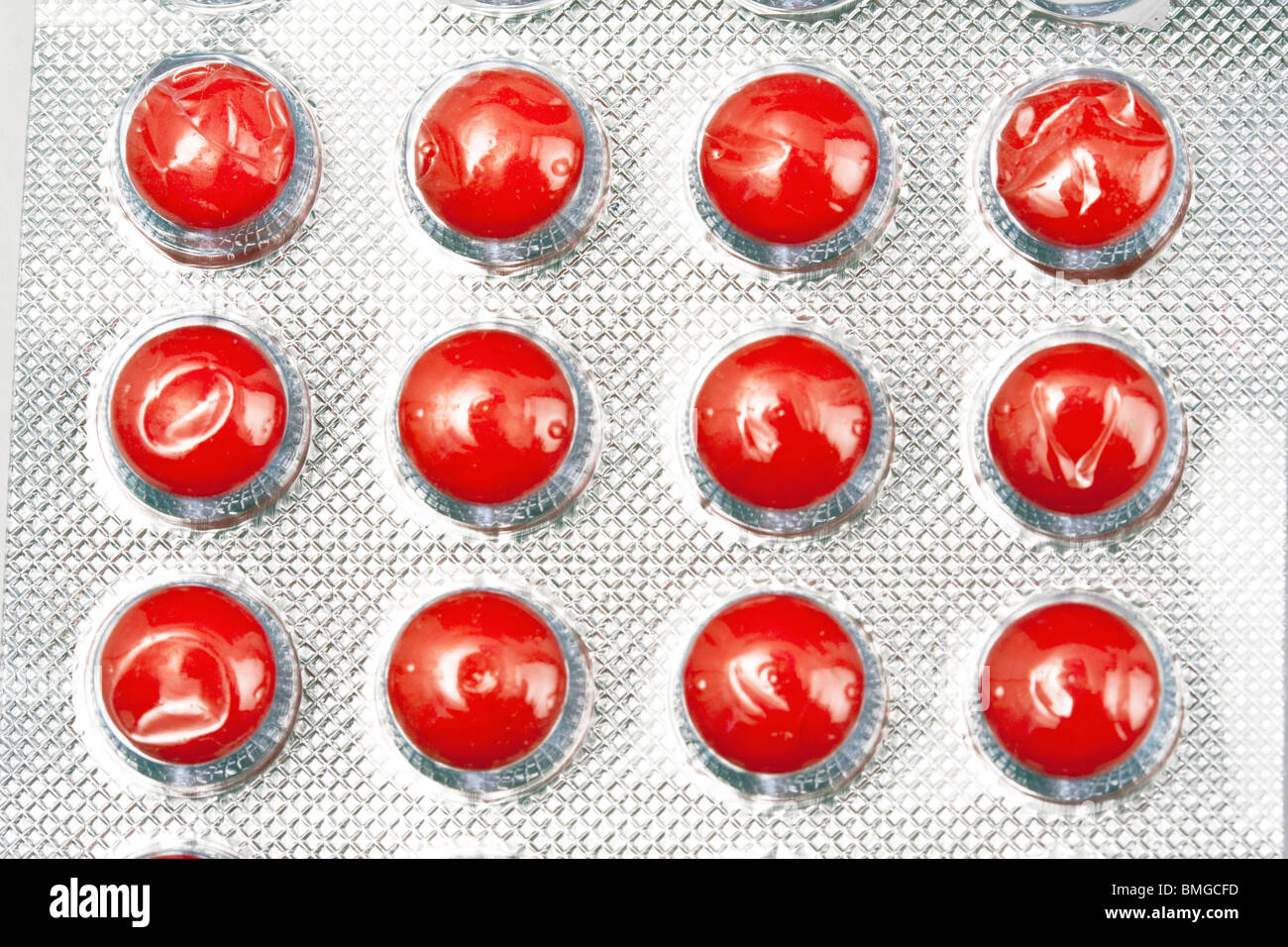 Set of red pills closeup Stock Photo - Alamy