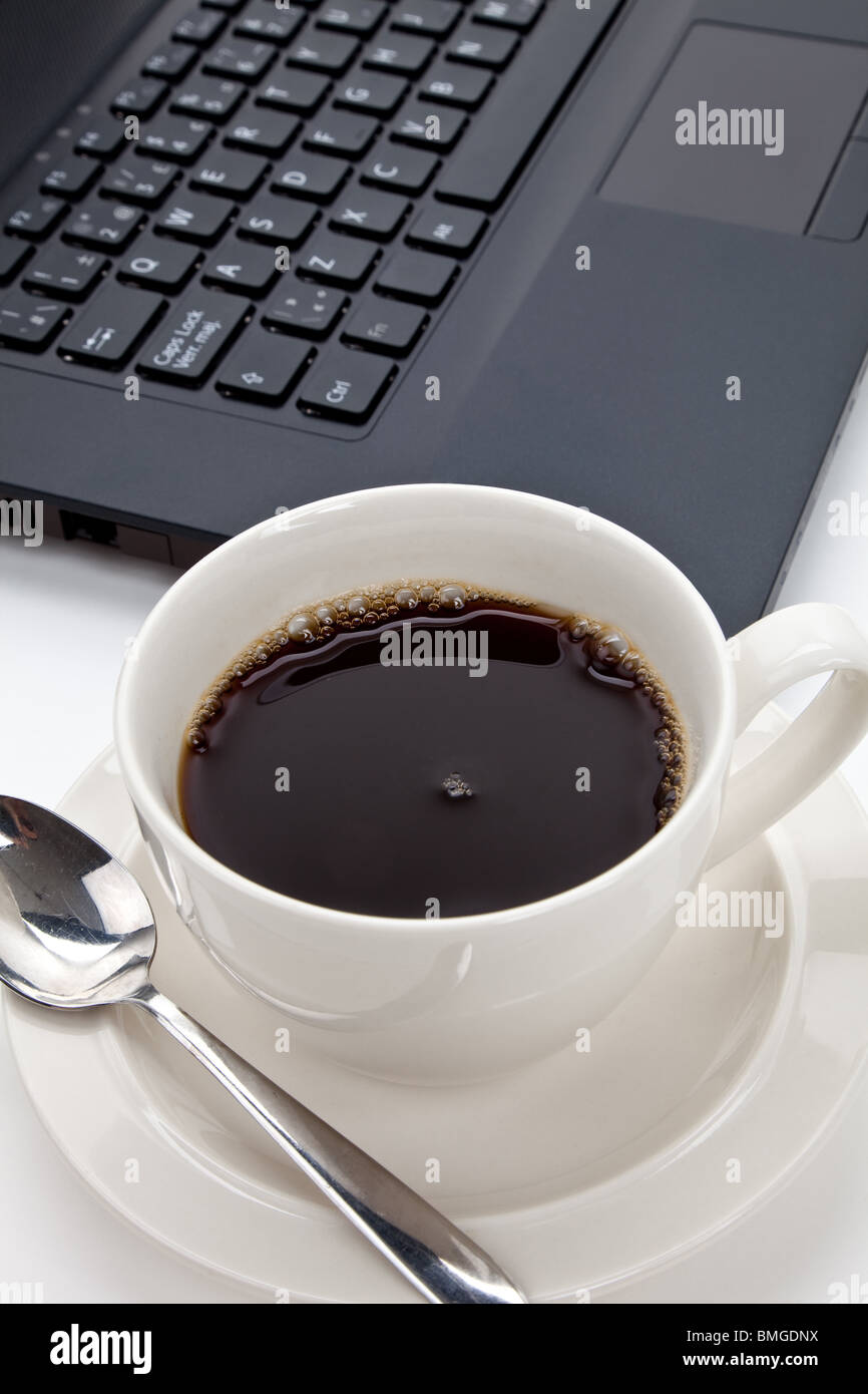 Laptop close up coffee spoon hi-res stock photography and images - Alamy