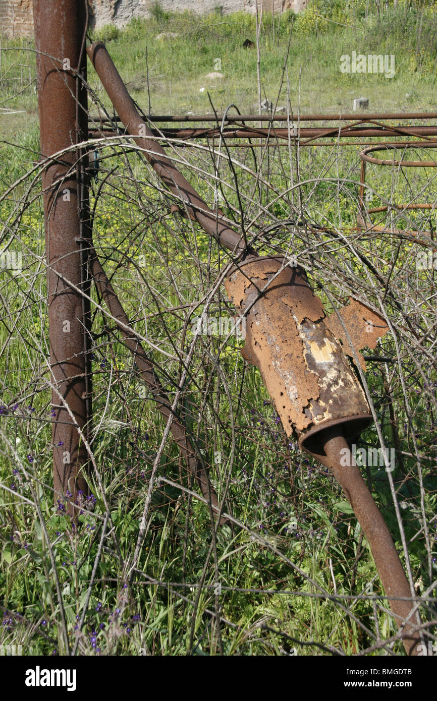 old rusty car exhaust pipe in field Stock Photo - Alamy