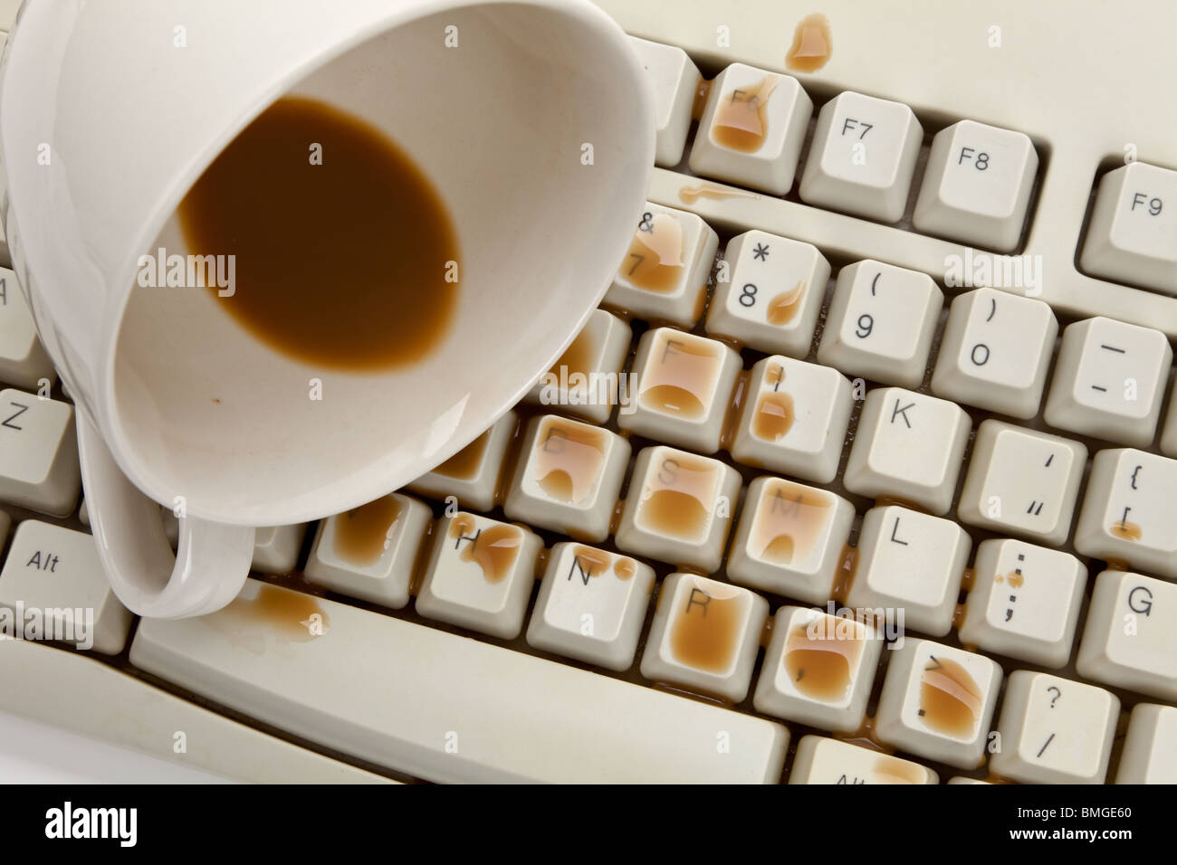Spilling coffee keyboard hi-res stock photography and images - Alamy