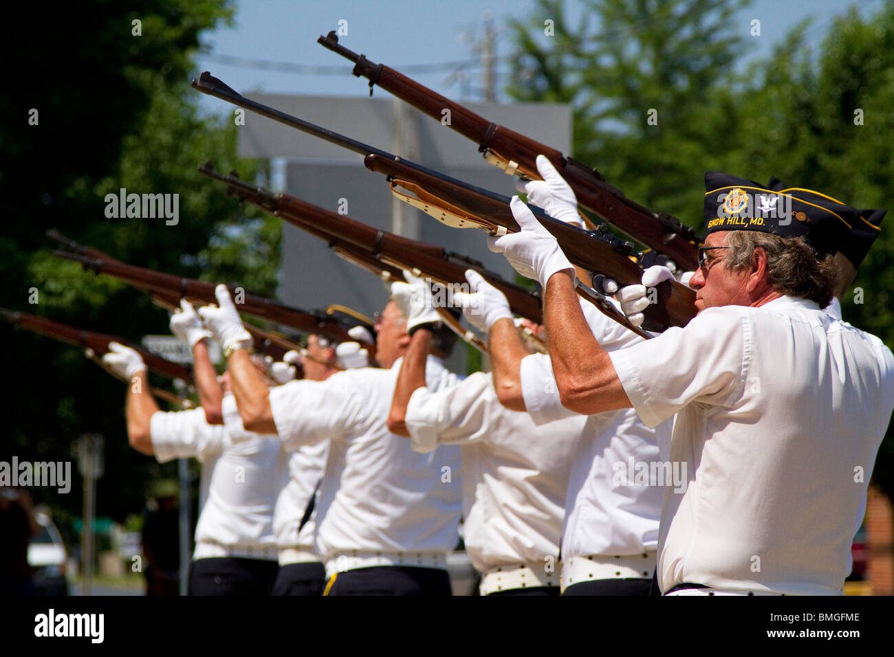 Memorial Day ceremony with veterans performing gun salute at Snow Hill ...