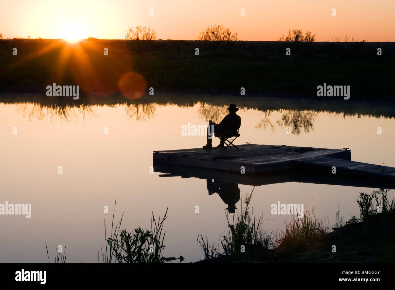 Sunrise at the dock - Los Novios Ranch - near Cotulla, Texas USA Stock ...
