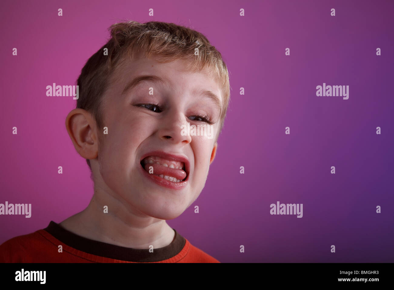 boy making face Stock Photo - Alamy
