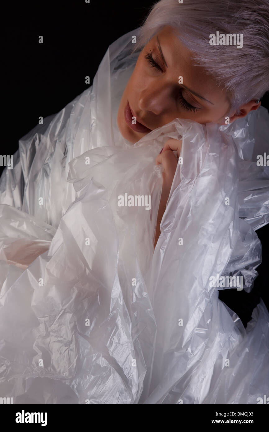 woman with plastic dress Stock Photo - Alamy