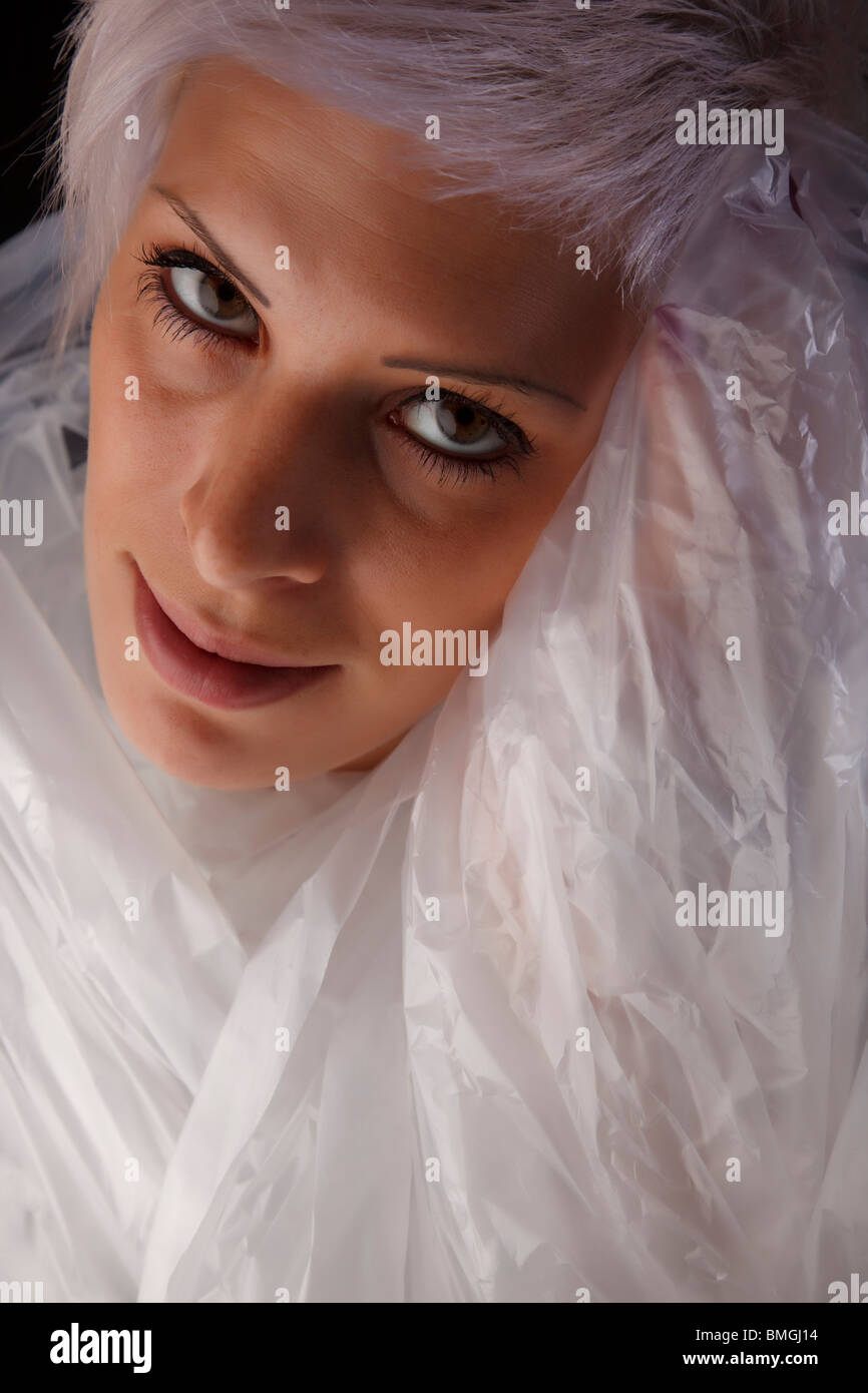 woman with plastic dress Stock Photo - Alamy