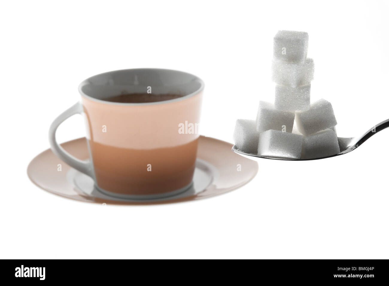 Many pieces of sugar to sweeten it isolated on a white background Stock ...