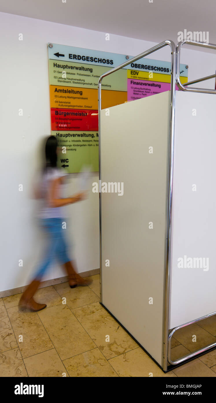 Young woman in a polling booth Stock Photo - Alamy