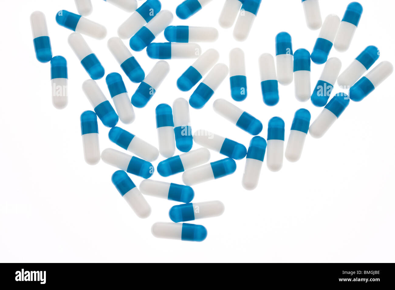 blue-white capsules, tablets of an analgesic Stock Photo - Alamy