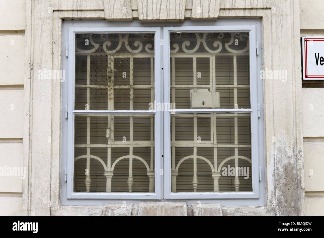 Locked and barred windows. Burglar safe Stock Photo - Alamy