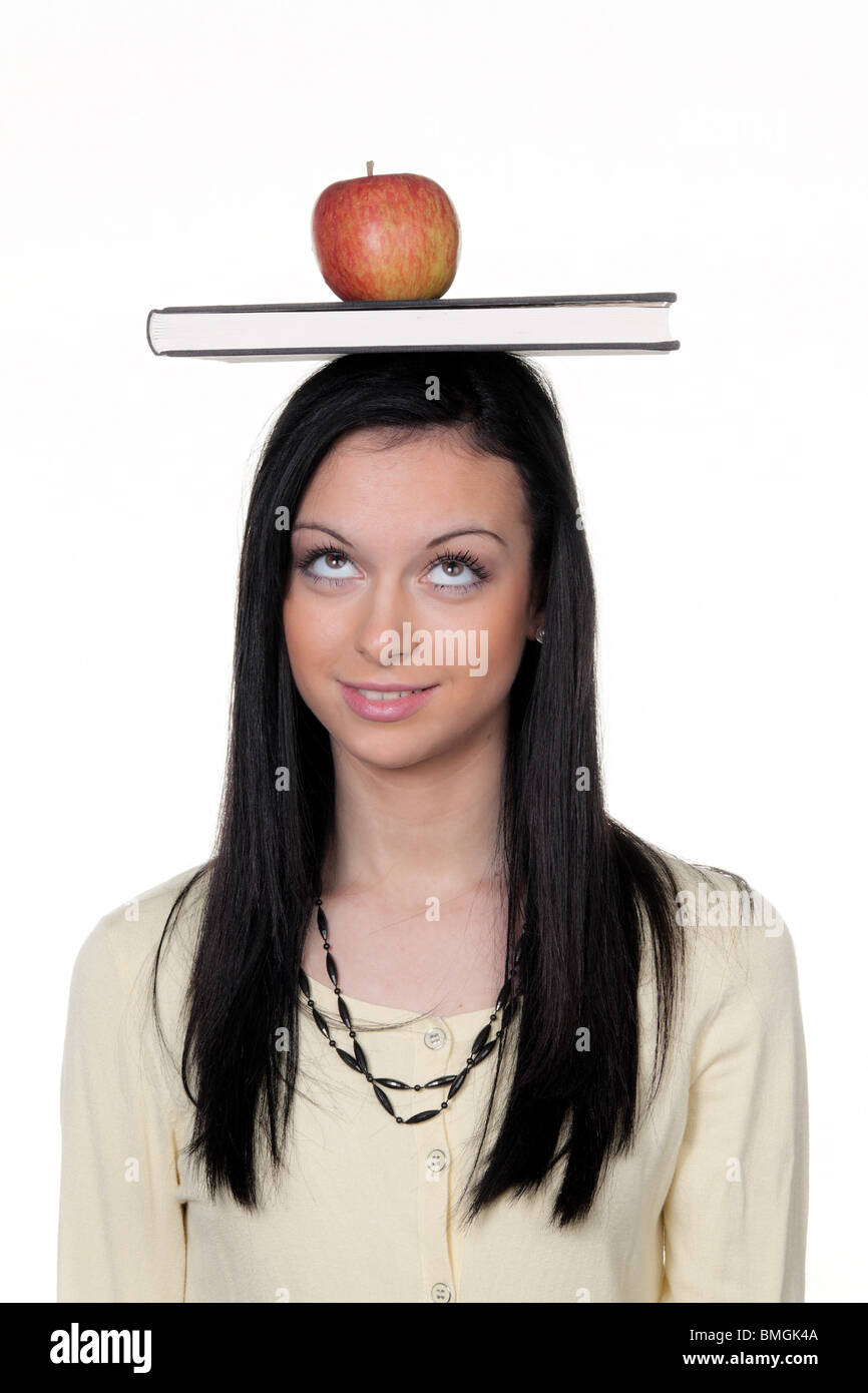 Student with apple and books learning Stock Photo - Alamy