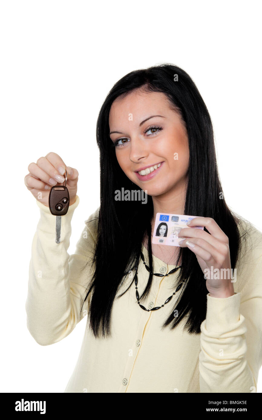 Woman with car keys and driver's license. Driving test Stock Photo - Alamy