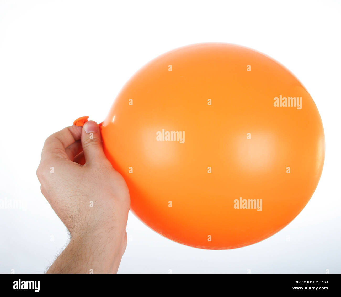 Ballon in a man's hand isolated Stock Photo - Alamy