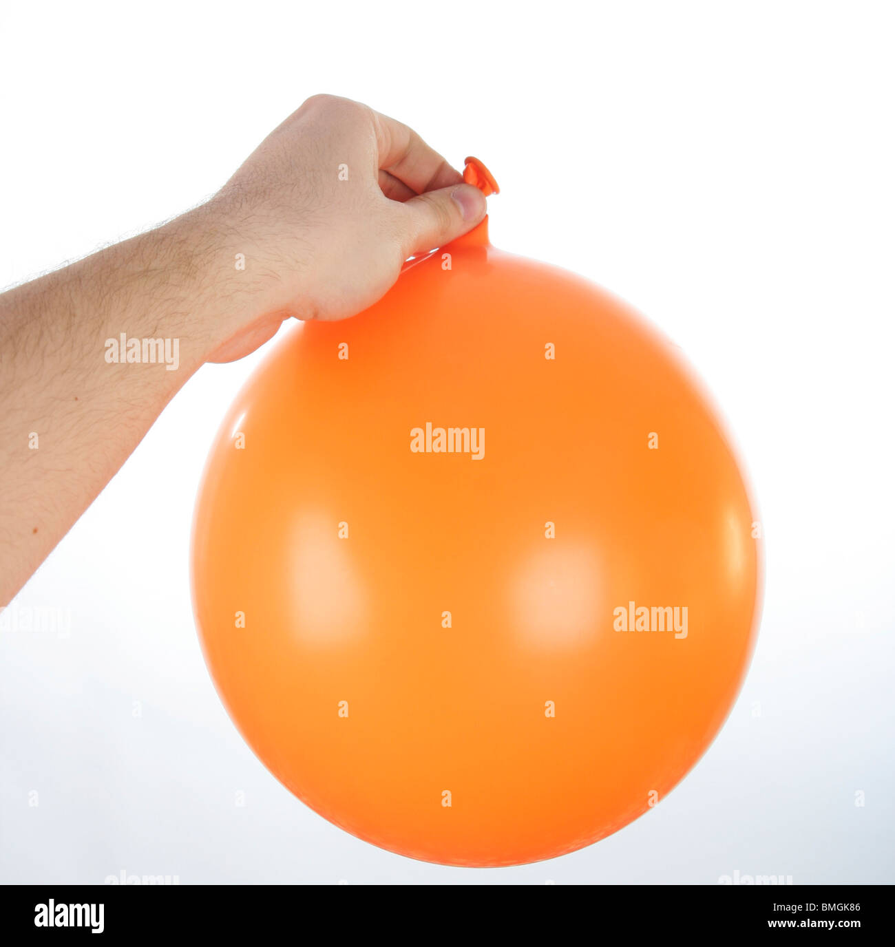 Ballon in a man's hand isolated Stock Photo - Alamy