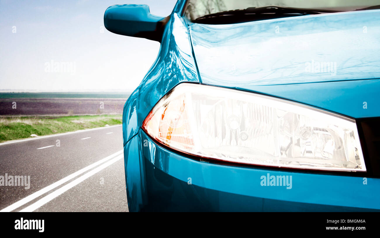 Great Car - Front side, half. On the road Stock Photo - Alamy