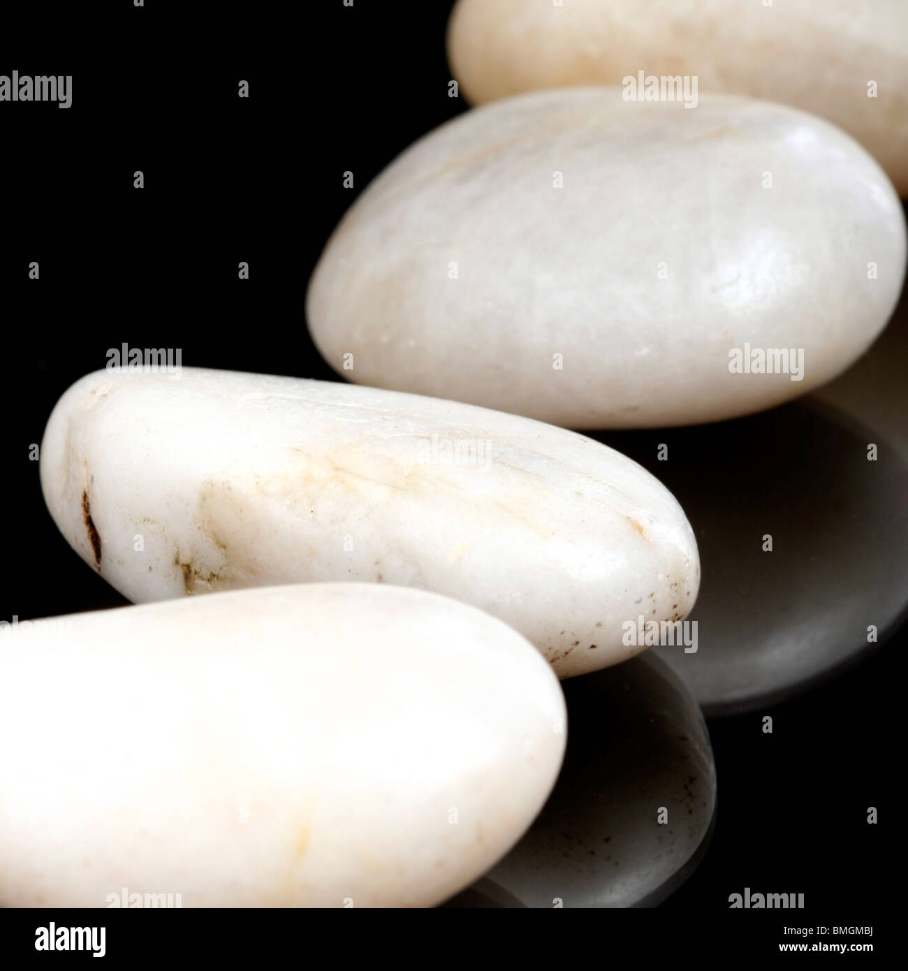 Concept made by many rocks isolated on black Stock Photo - Alamy