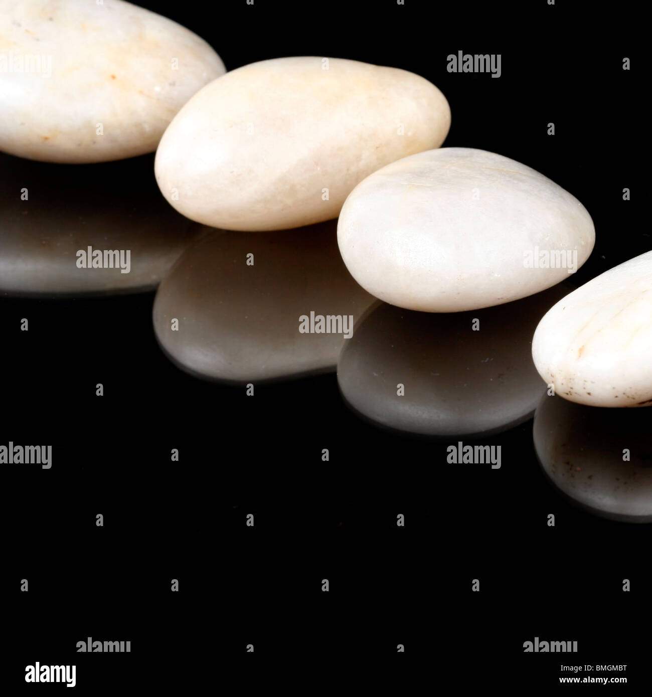 Concept made by many rocks isolated on black Stock Photo - Alamy