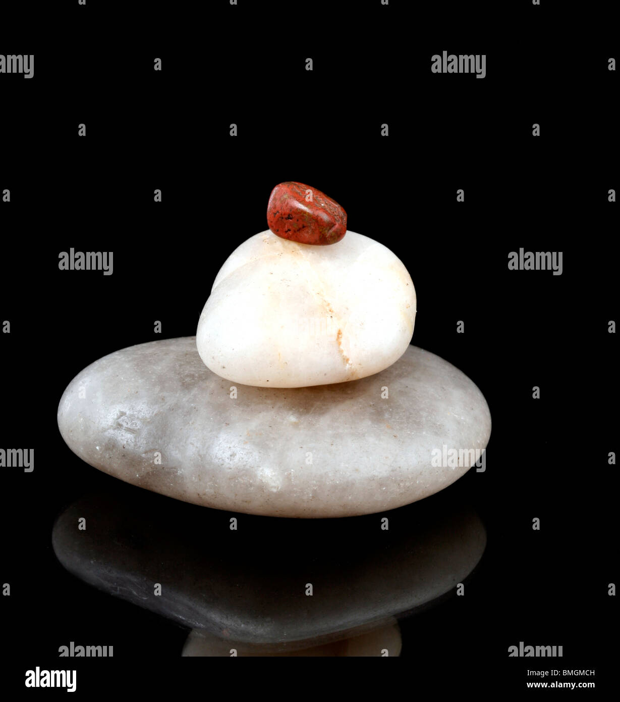 Concept made by many rocks isolated on black Stock Photo - Alamy