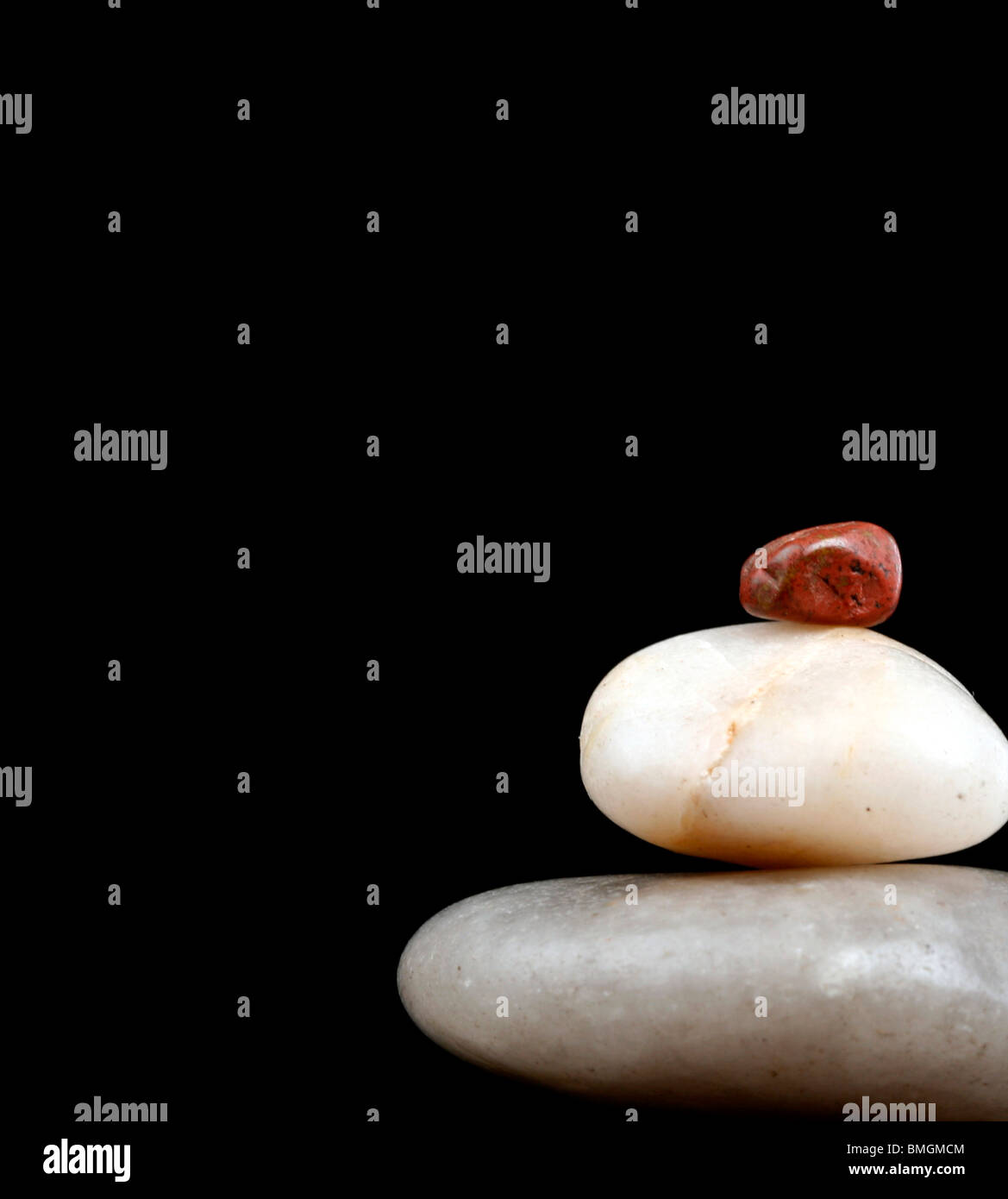 Concept made by many rocks isolated on black Stock Photo - Alamy