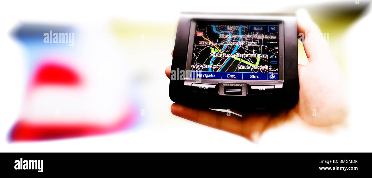 Gps in a man hand. Find your way ! Stock Photo - Alamy