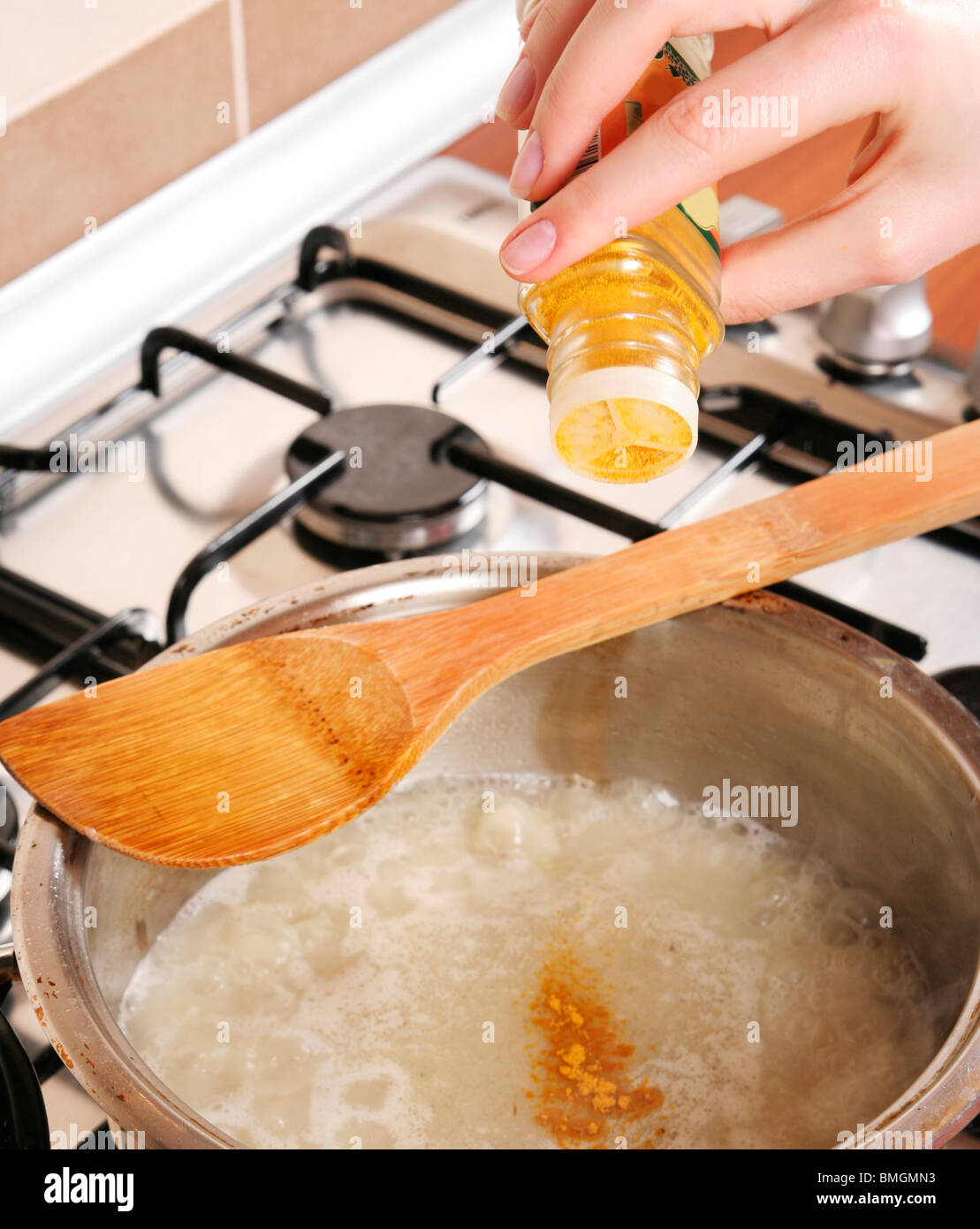 Cooking rice on the cooker Stock Photo - Alamy