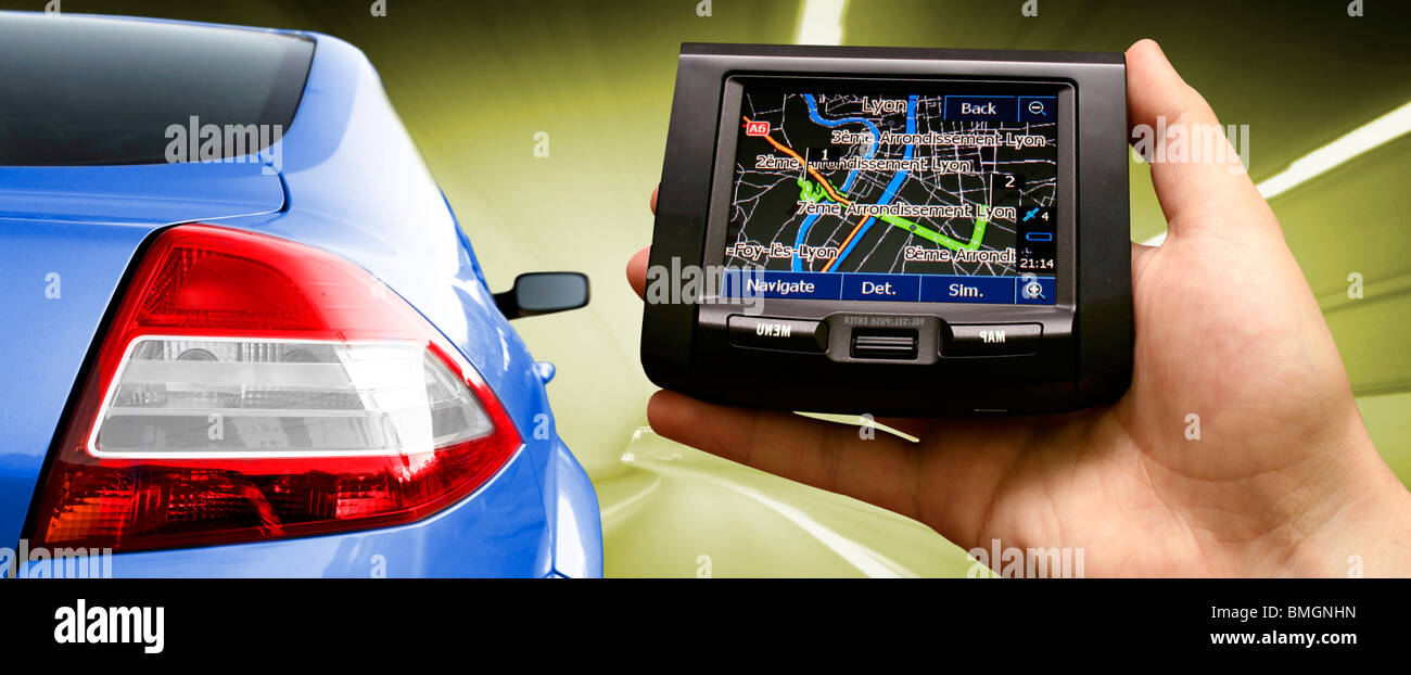 Gps in a man hand. Find your way ! Stock Photo - Alamy
