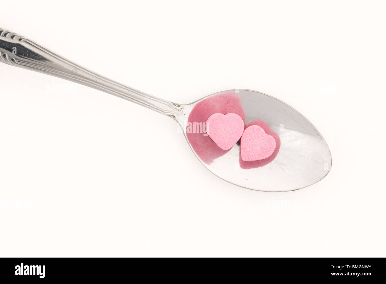 Pink Heart Shape Candy, Concept of Love Pill Stock Photo - Alamy