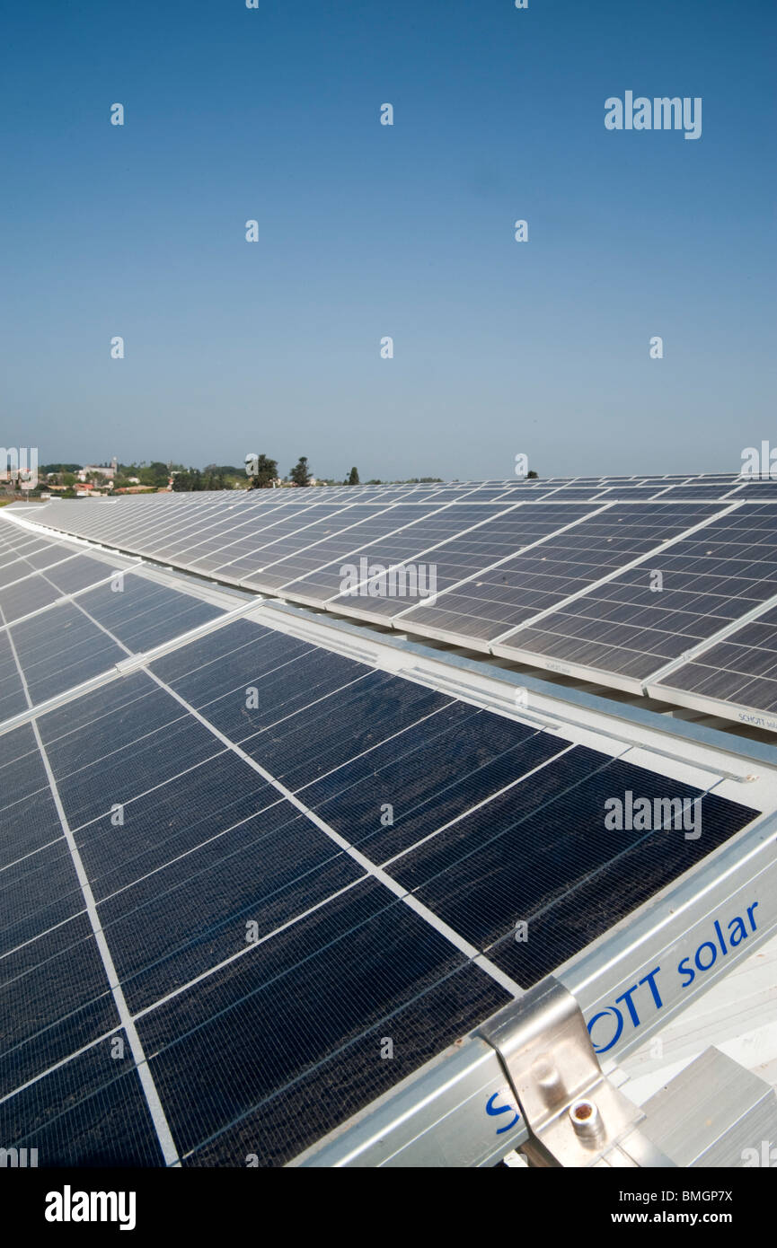 Electricity converting solar panels on a roof of a cowshed Stock Photo ...