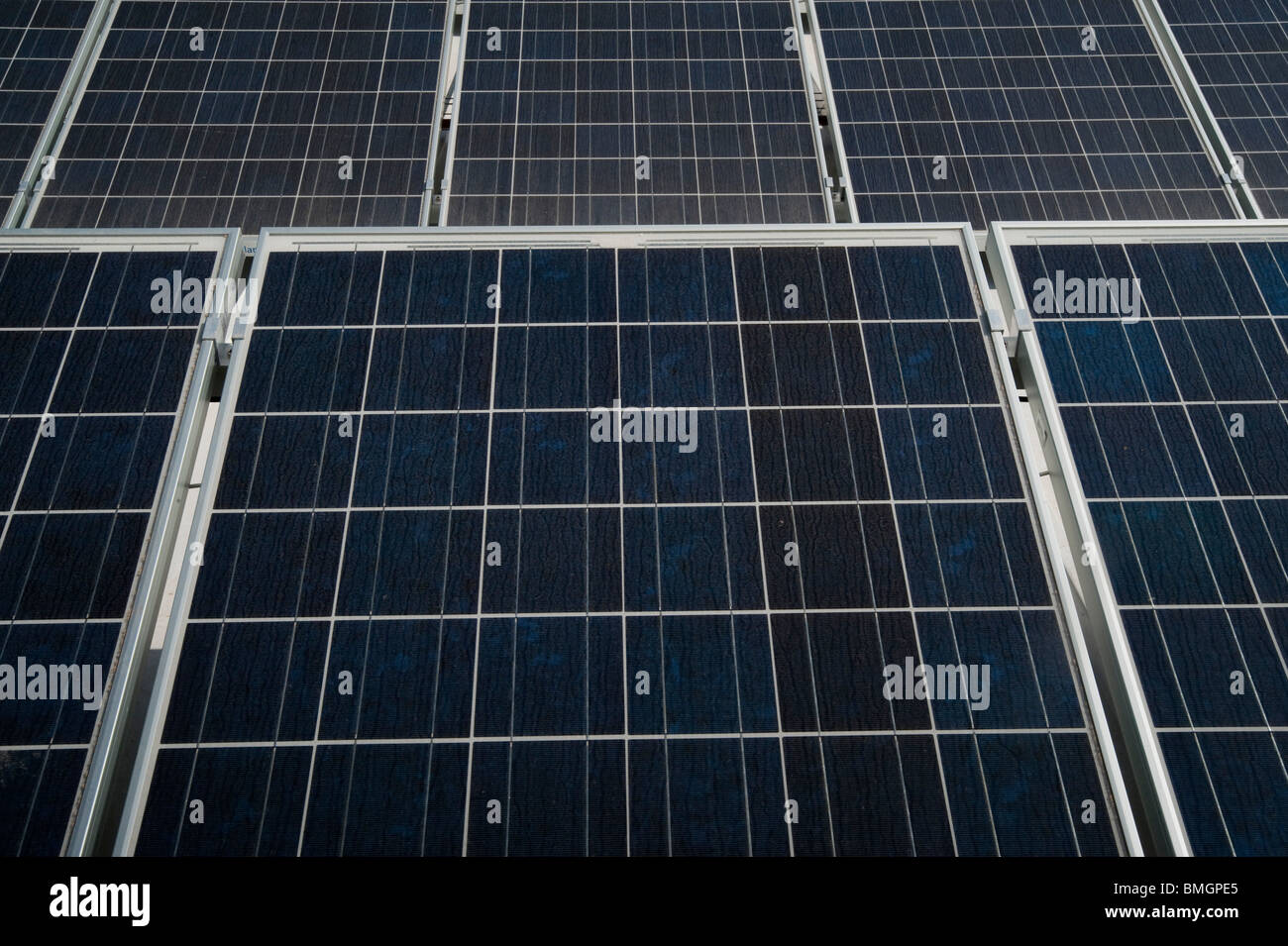 Electricity converting solar panels on a roof of a cowshed Stock Photo ...