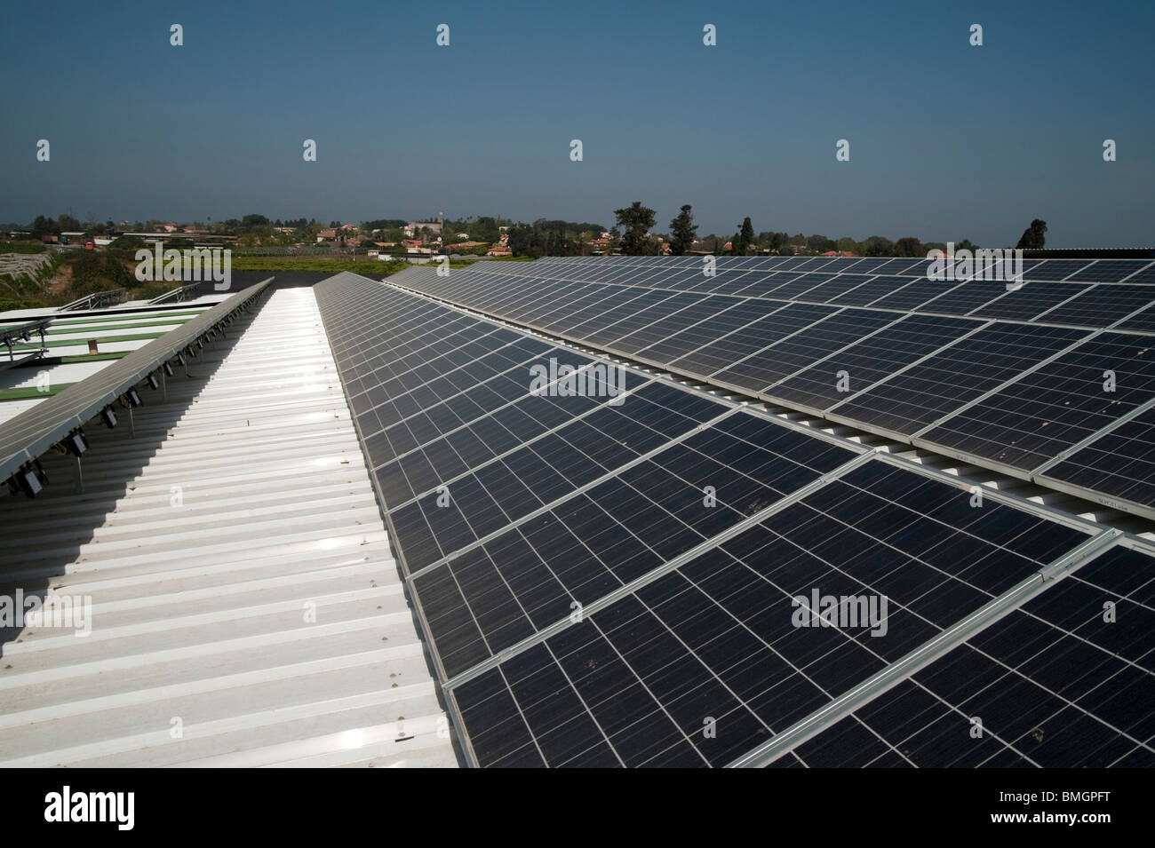 Electricity converting solar panels on a roof of a cowshed Stock Photo ...