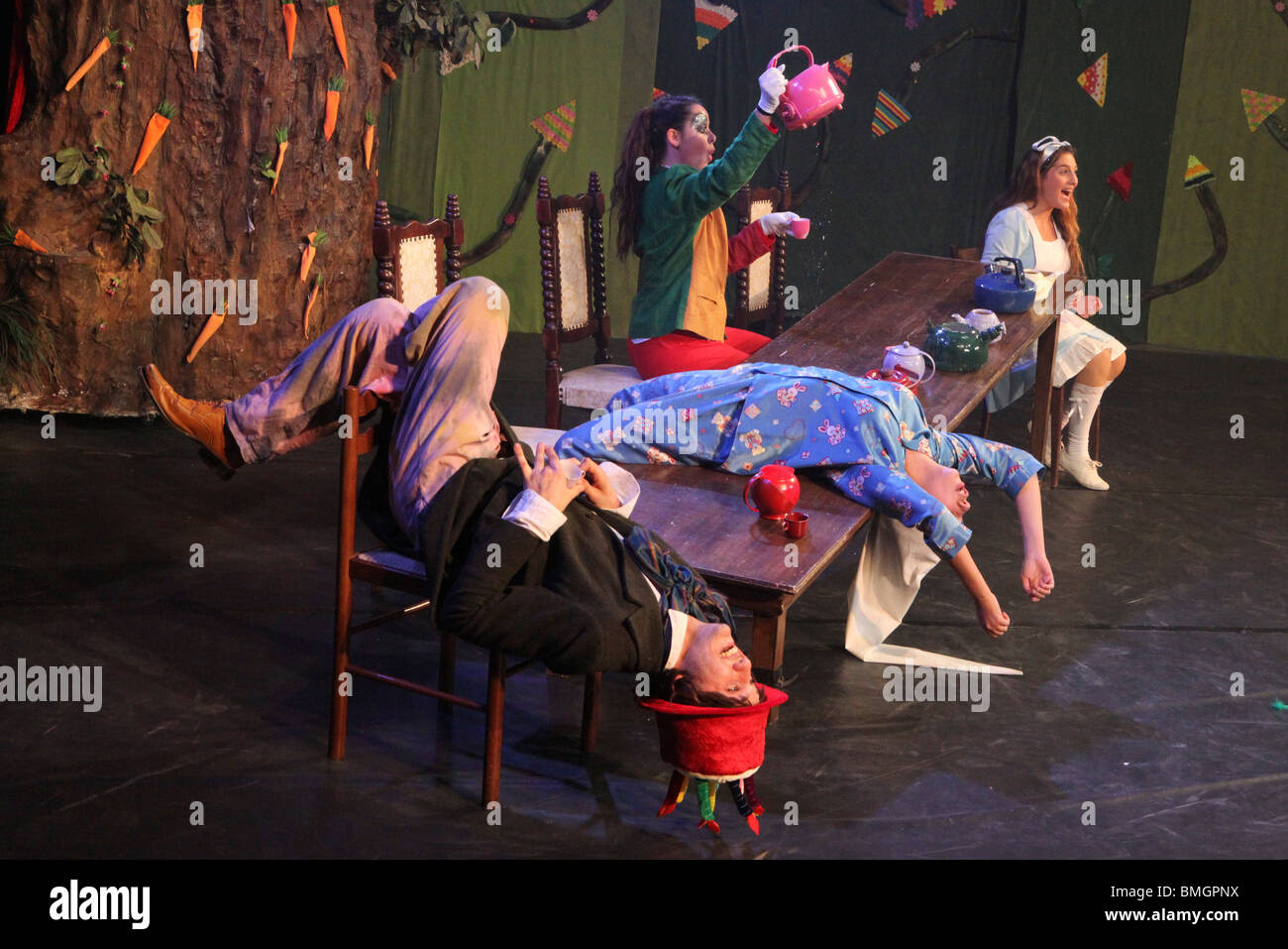 Alice in wonderland mad hatter tea party hi-res stock photography and ...