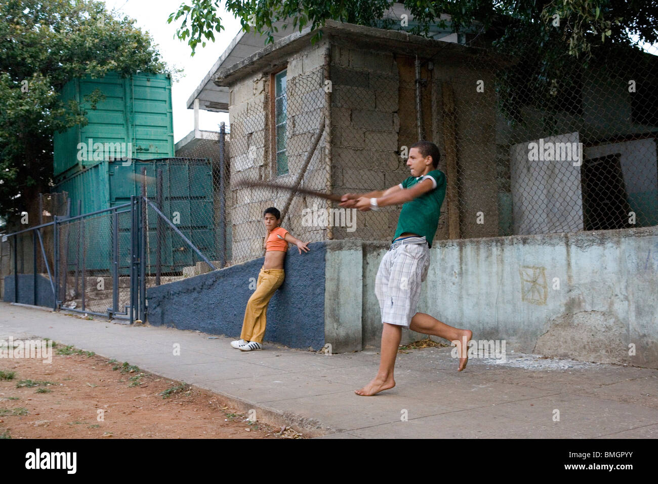 Boys play baseball on the street in Havana, Cuba Stock Photo - Alamy