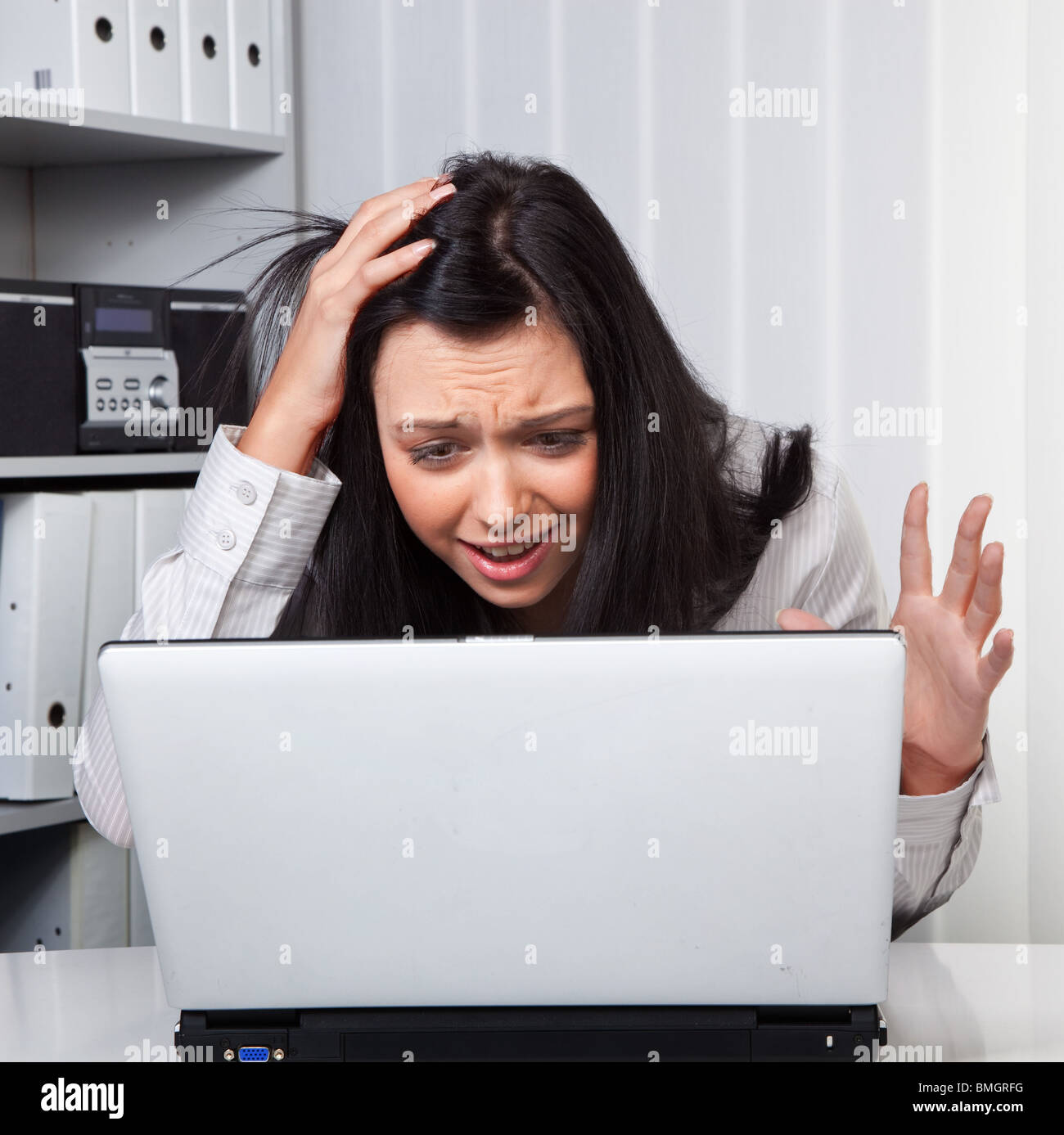 Desperate young woman facing problem hi-res stock photography and ...