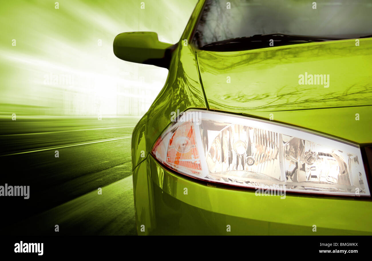 Green Sport Car - Front side - on the road Stock Photo - Alamy