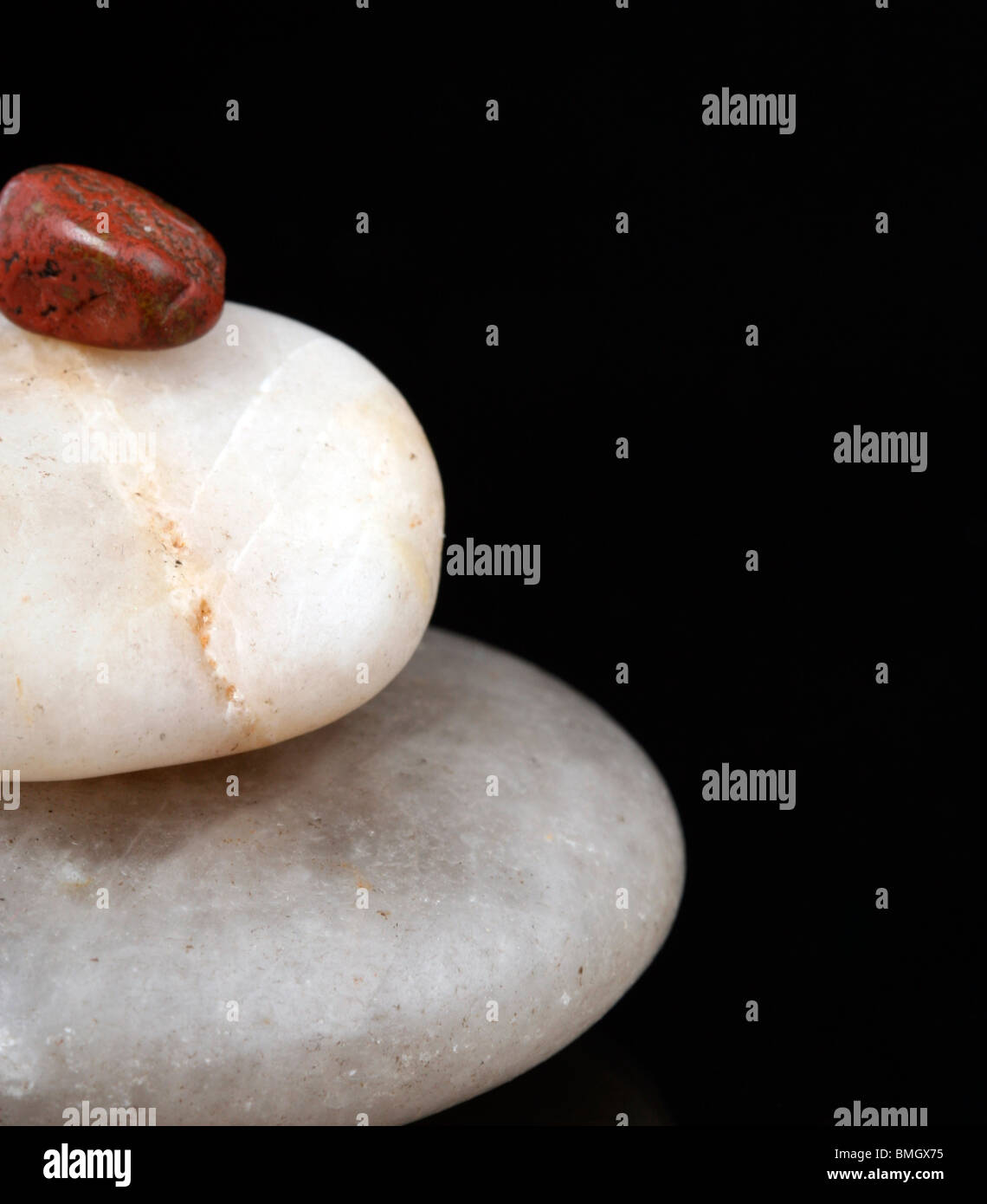 Concept made by many rocks isolated on black Stock Photo - Alamy