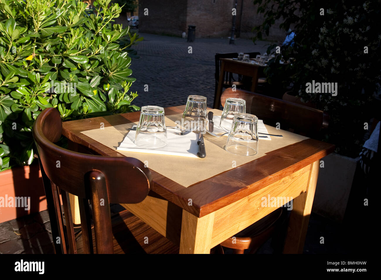 trattoria restaurant pizzeria table set on street in Rome Italy Stock ...