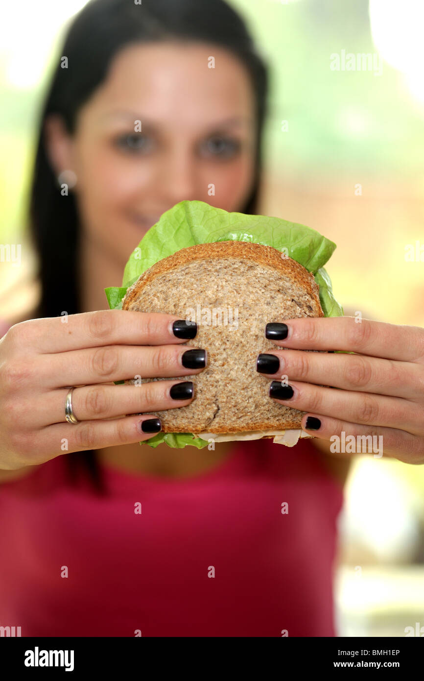 Teenage Girl Eating Sandwich. Model Released Stock Photo - Alamy