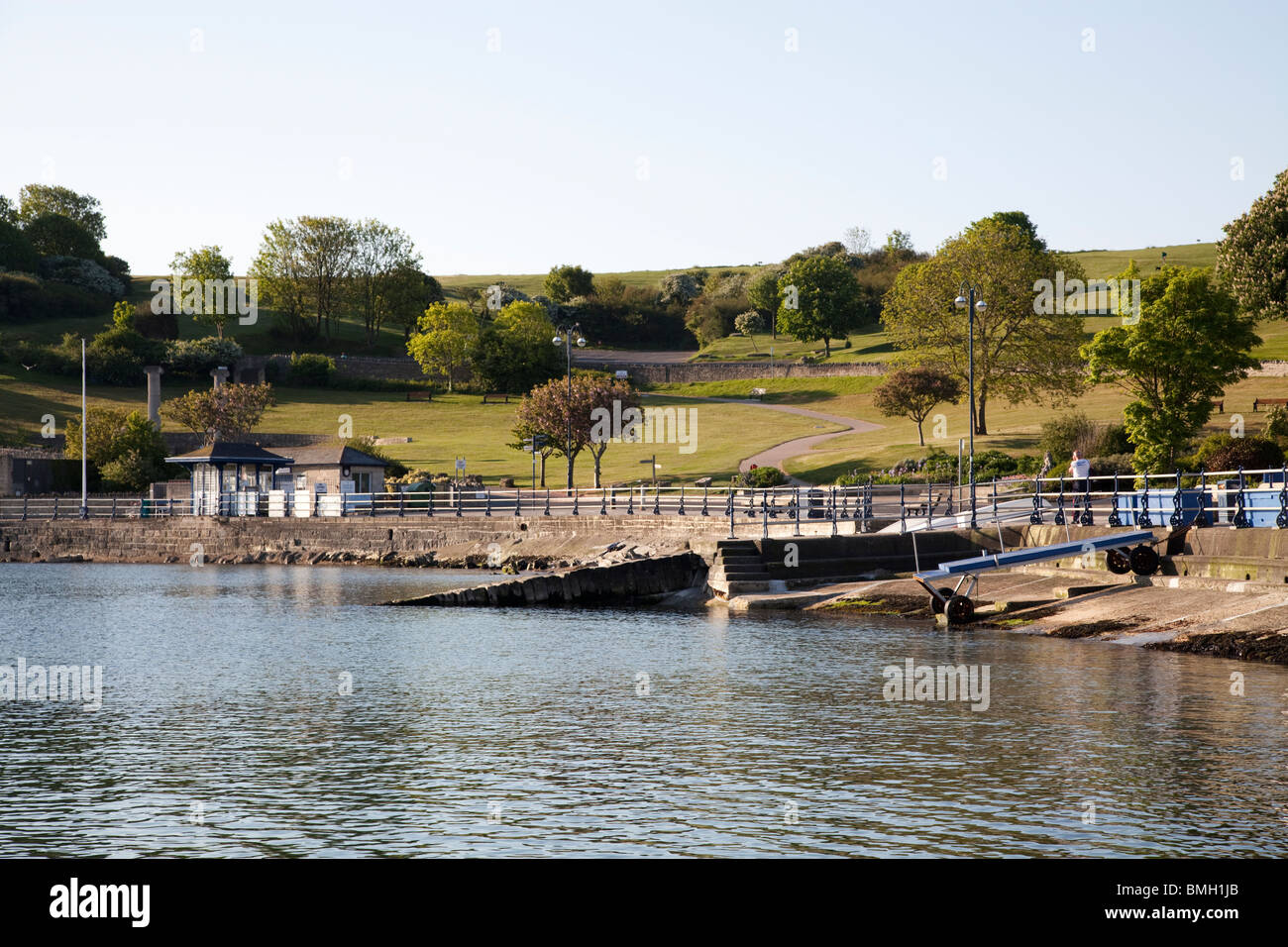 stone groynes and sea wall at Swanage bay Stock Photo - Alamy