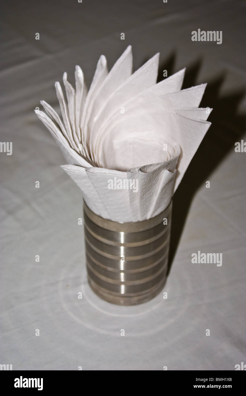 Tissue paper arranged in a steel glass Stock Photo - Alamy