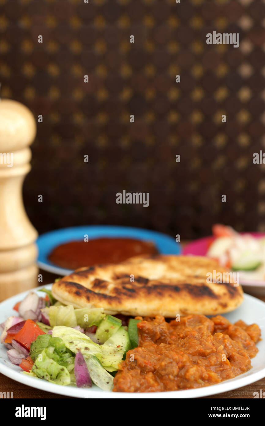 Beef Curry with Naan Bread Stock Photo - Alamy