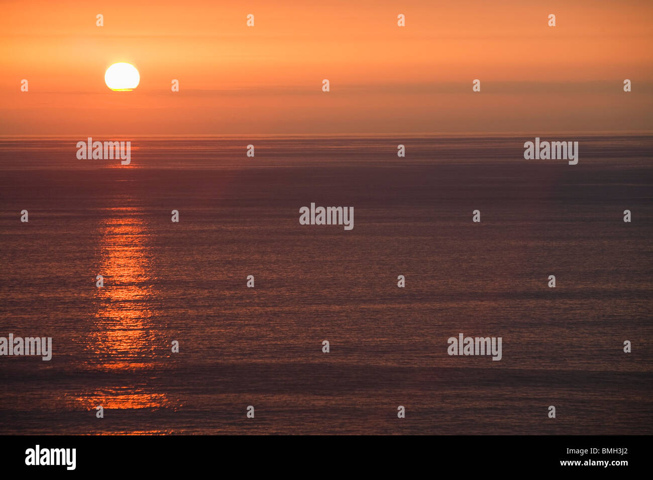 Sun Over The Ocean Stock Photo - Alamy