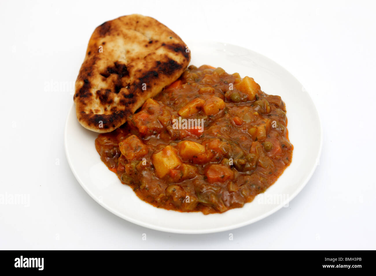 Vegetable Curry with Naan Bread Stock Photo - Alamy